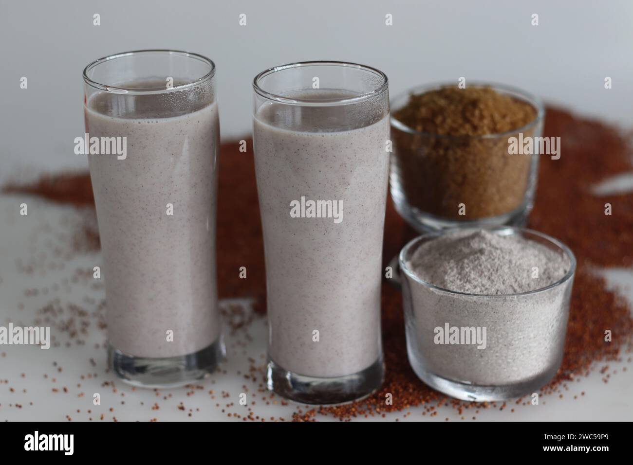 Ragi Malt. Two tall glasses of nutritious ragi porridge along with the ...
