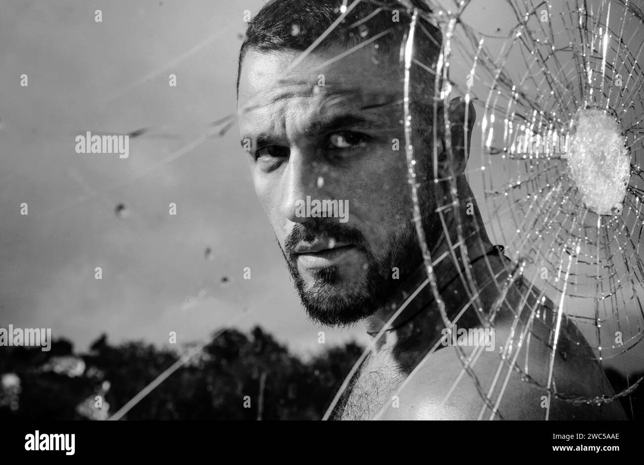 Portrait of handsome man. Gang guy. Spooky criminal person Stock Photo ...