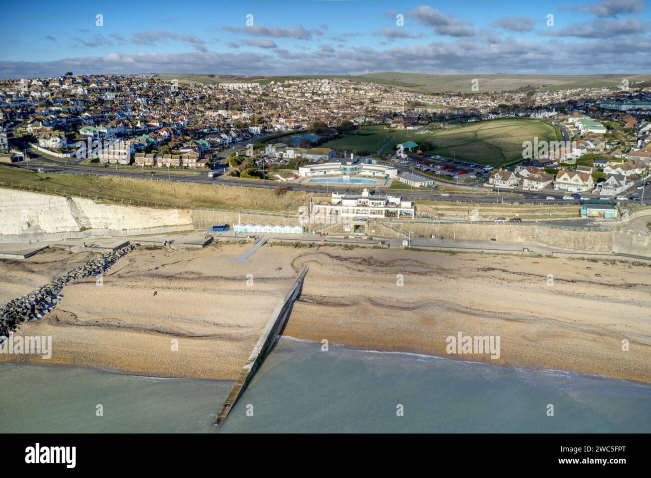 Aerial view along Saltdean seafront in East Sussex with the Saltdean ...