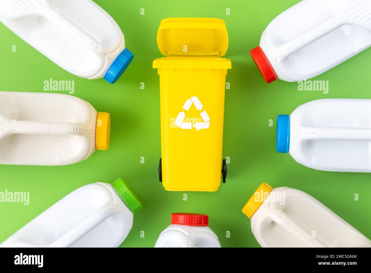 Segregation of plastic waste, garbage can and plastic bottles on a ...