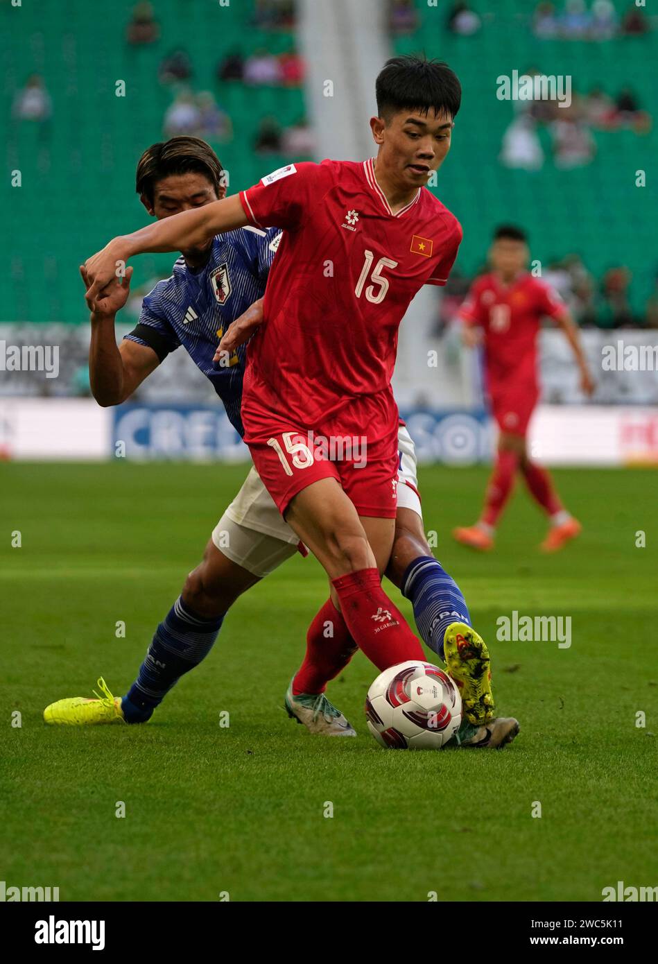 Vietnam's Nguyen Dinh Bac, front, is challenged by Japan's Hidemasa ...
