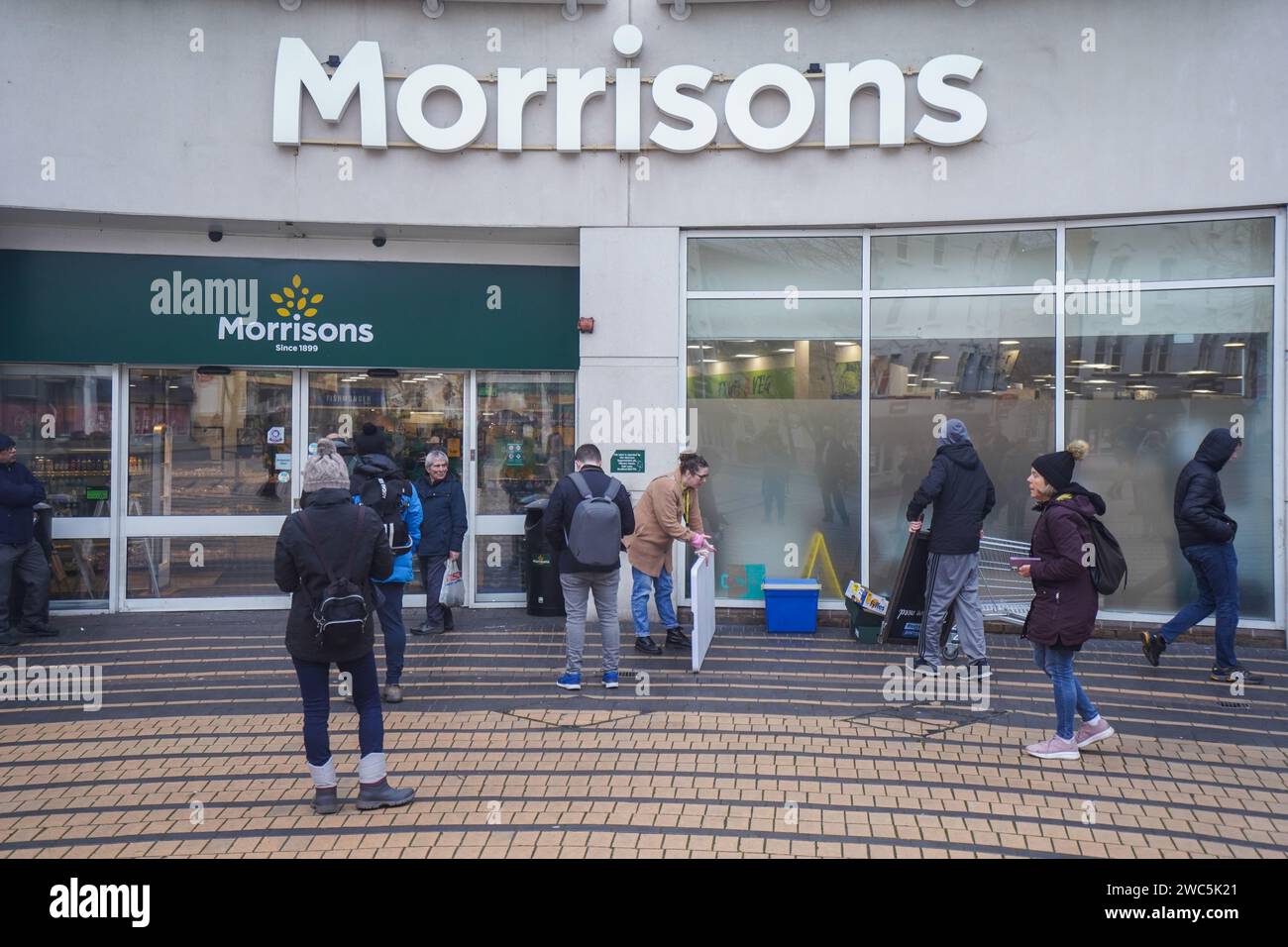 London, UK. 14 January 2024. . Shoppers at a local Morrisons branch in ...