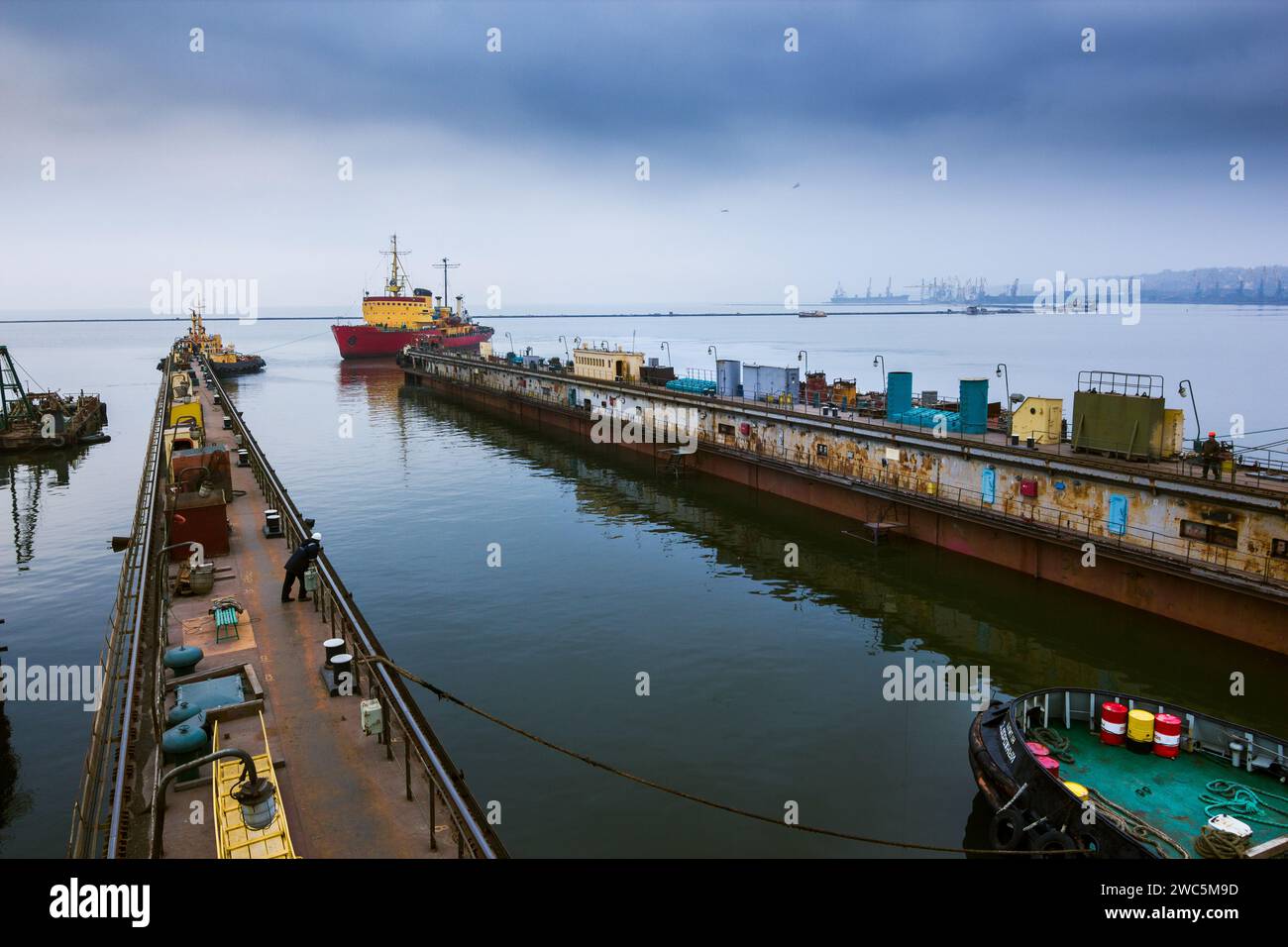 Icebreaker ship navigates into floating dock for maintenance at ...
