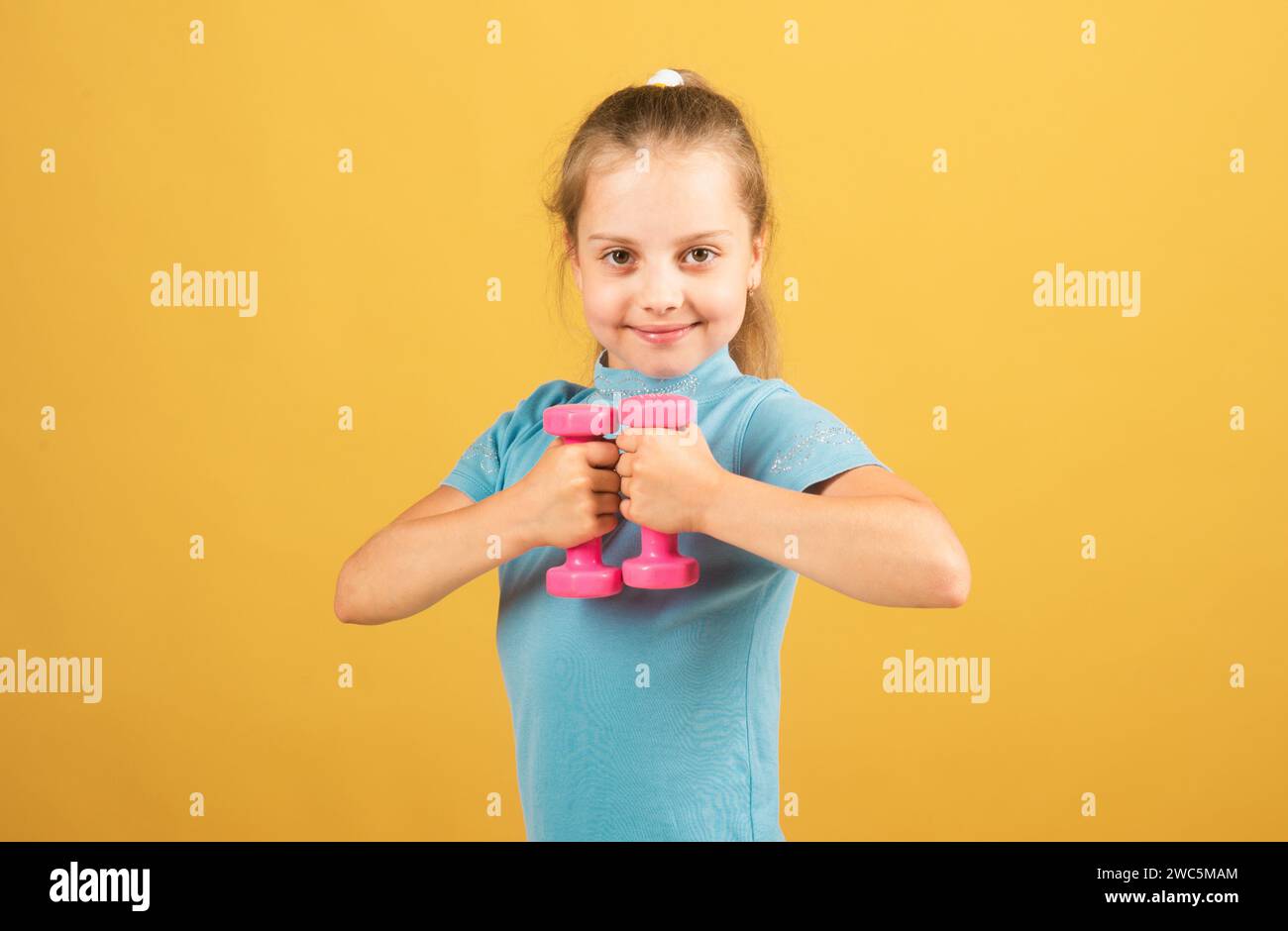 Sporty child with dumbbells. Kids sport and fitness, health and energy ...