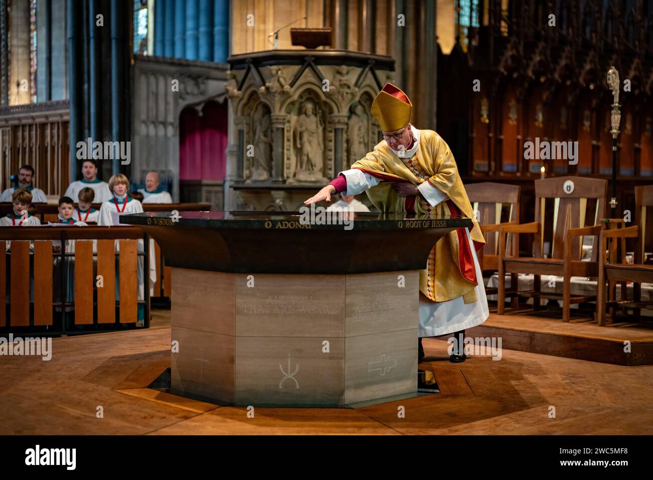 The Right Revd Stephen Lake, Bishop of Salisbury, rubs oil as he ...