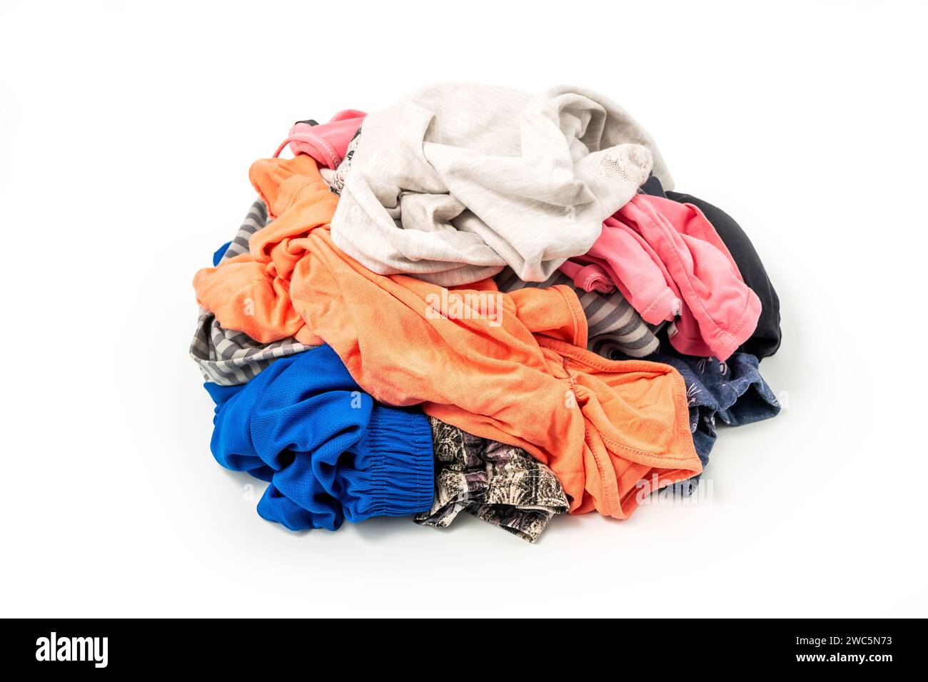 Textile ready to recycle, isolated on white background. Heap of used ...