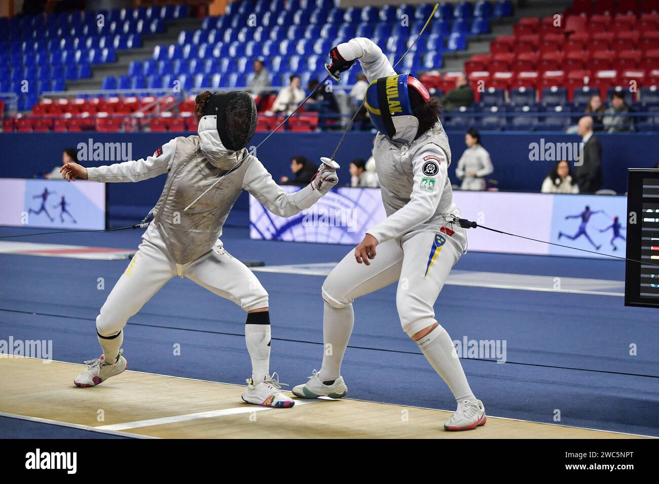 Paris, France. 14th Jan, 2024. Germany's foilist ALIYA DHUIQUE-HEIN (L ...