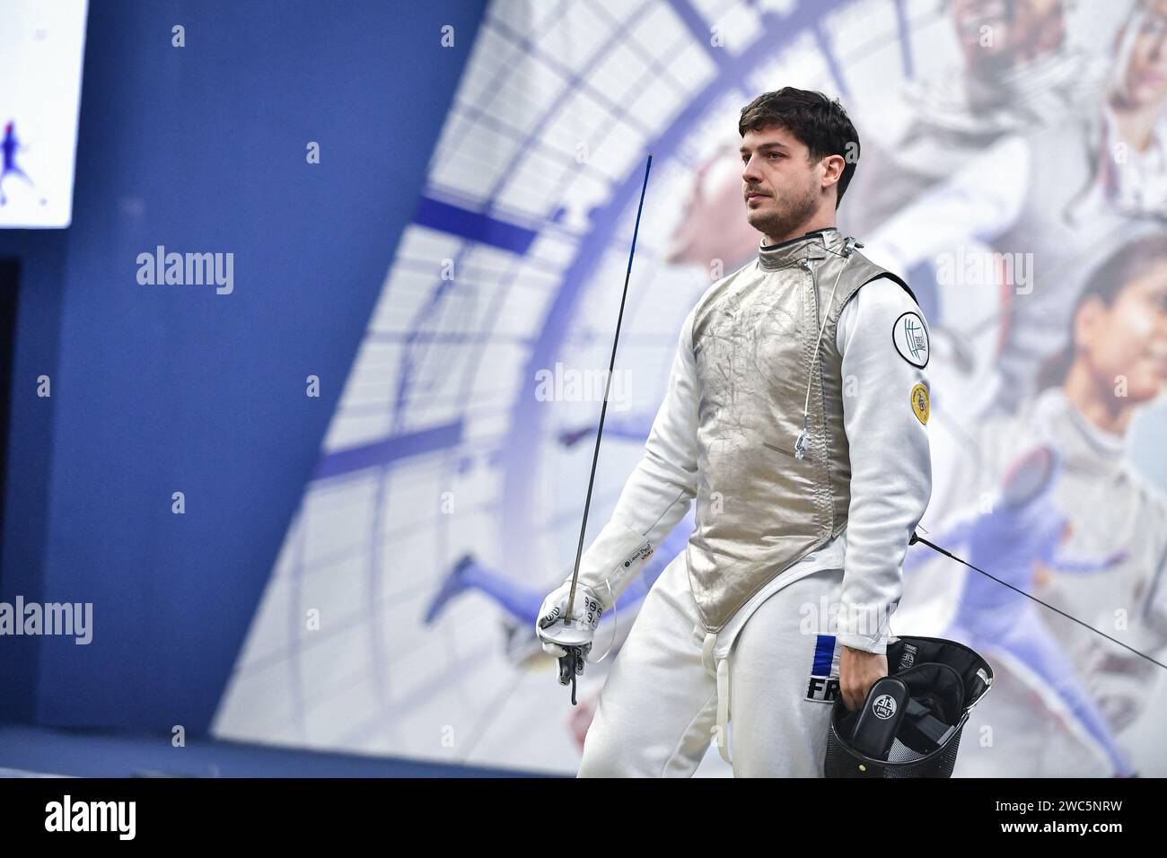 Paris, France. 14th Jan, 2024. France's foilist MAXIME PAUTY looks on ...