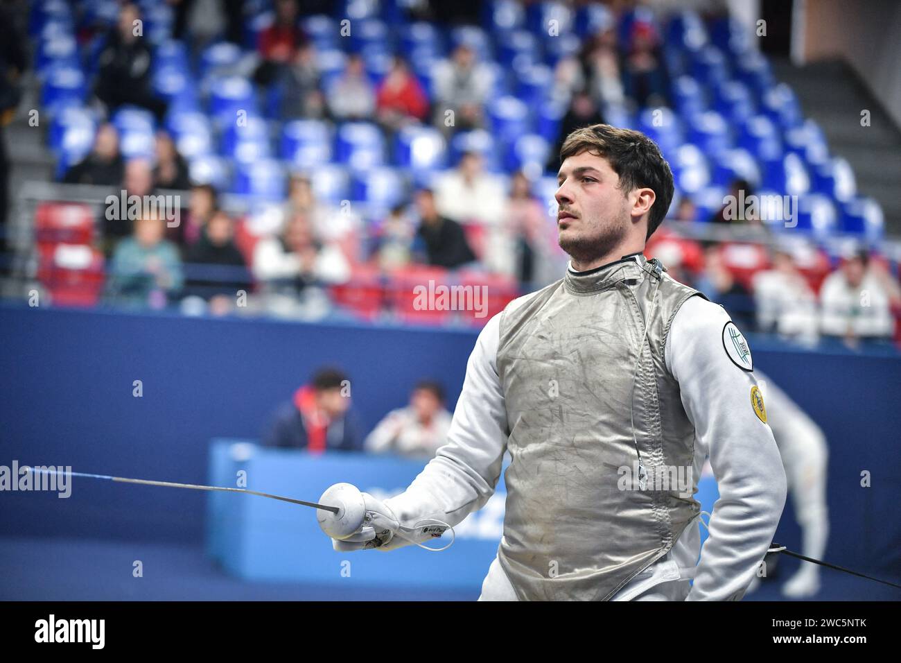 Paris, France. 14th Jan, 2024. France's foilist MAXIME PAUTY looks on ...