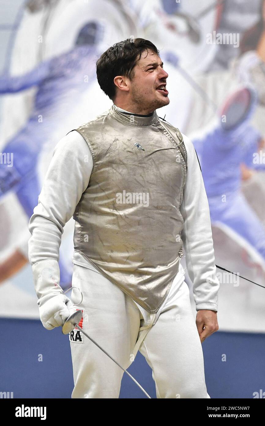 Paris, France. 14th Jan, 2024. France's foilist MAXIME PAUTY celebrates ...