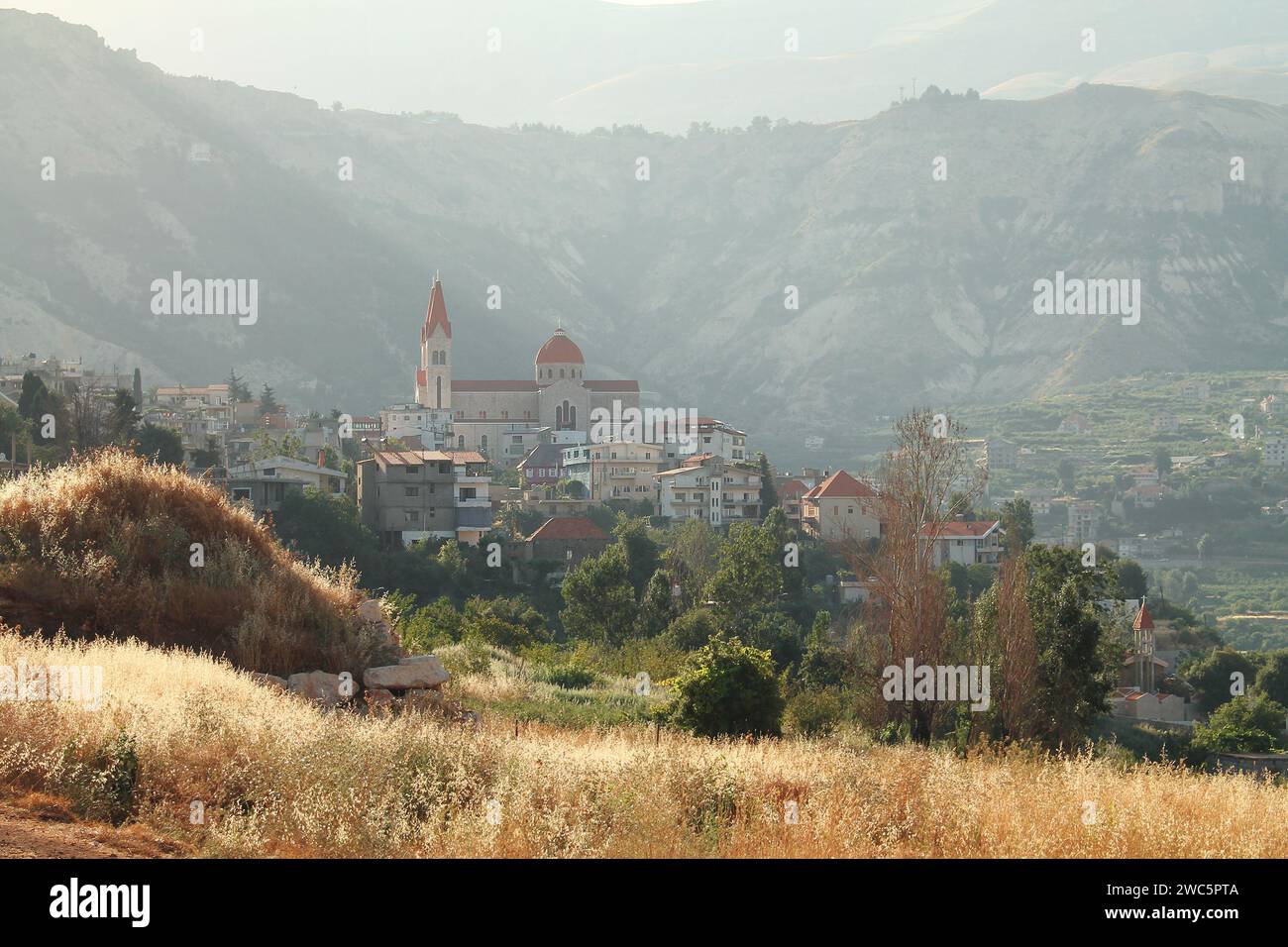 Saint Saba church in the Lebanese town of Bcharre surrounded with trees ...