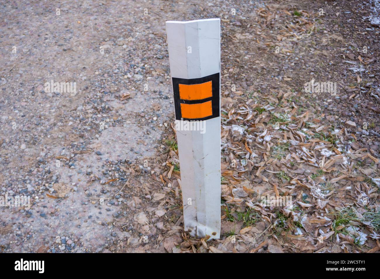 Orange barrels, barricades, and signs blocking a road Stock Photo - Alamy