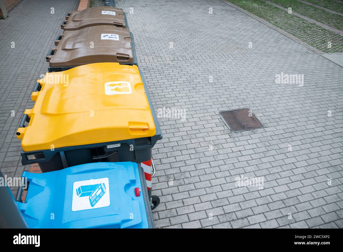 Recycling bins for plastic, cardboard and organic in their colors for ...