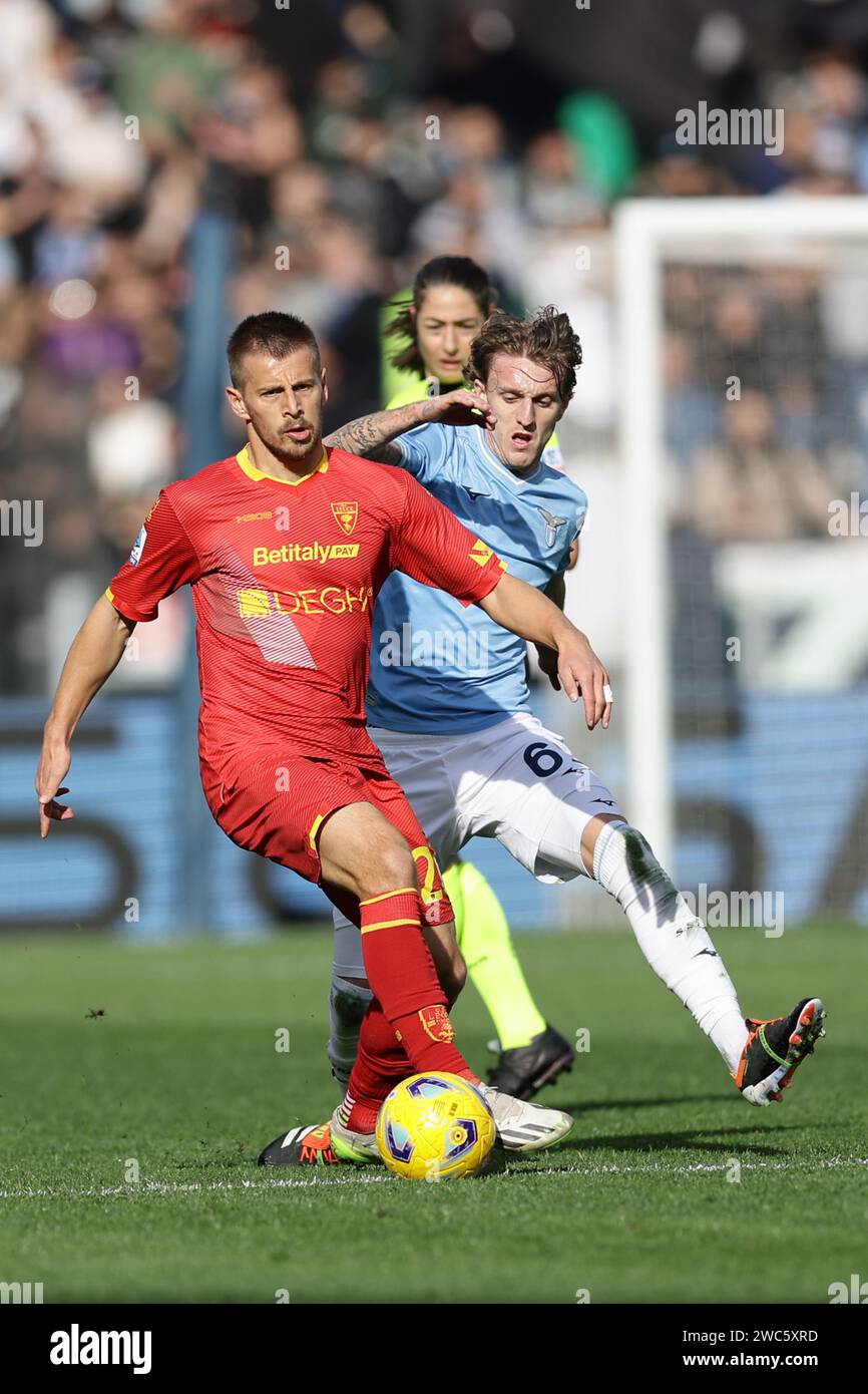 Lecce’s Albanian midfielder Ylber Ramadani challenges for the ball with ...