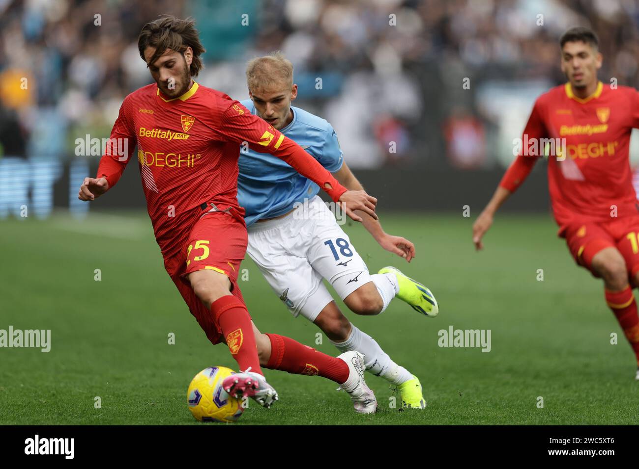 Lazio’s Danish midfielder Gustav Isaksen challenges for the ball with ...