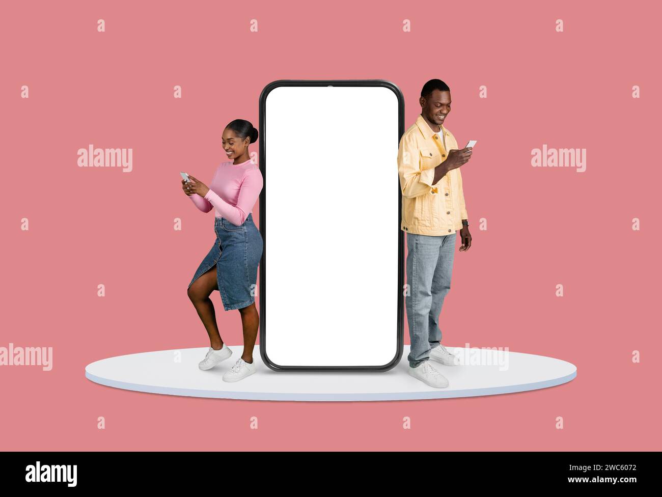 Black man and woman using phones by blank tall phone screen Stock Photo ...
