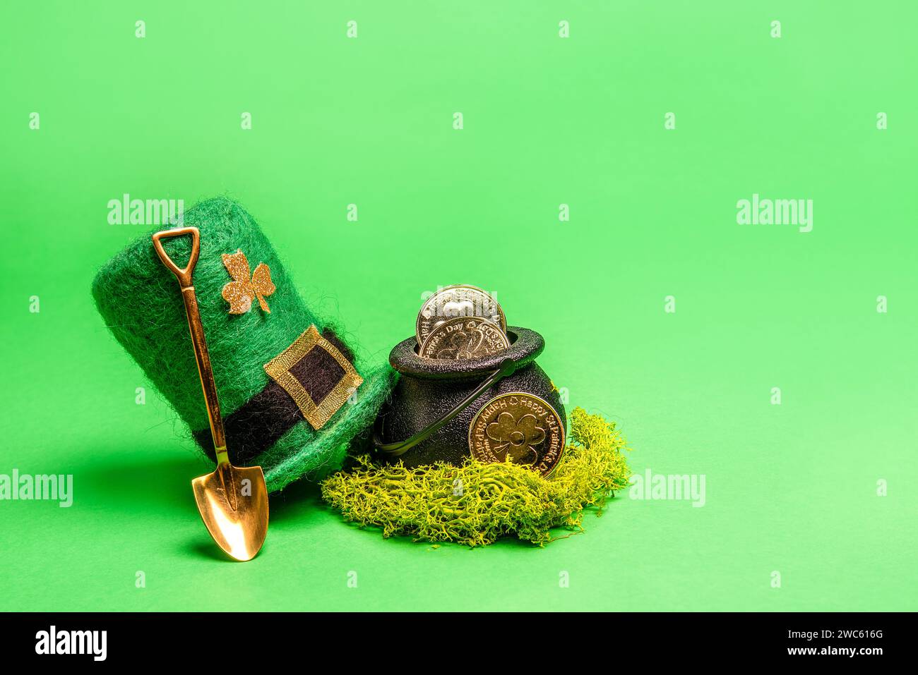 On green isolated background St. Patricks hat, leprechaun kettle with ...