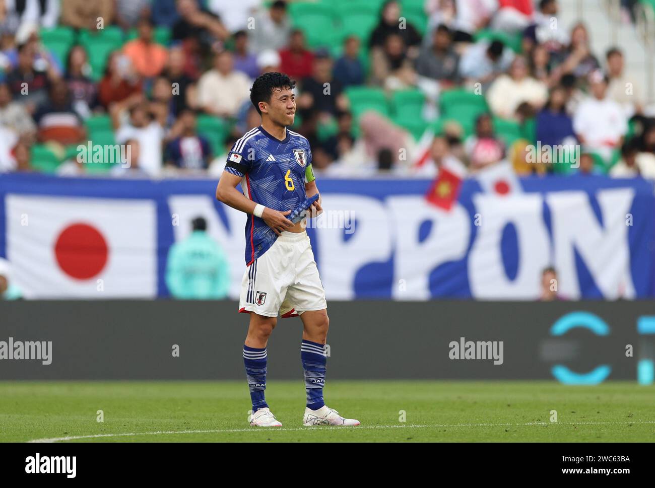 Doha. 14th Jan, 2024. Endo Wataru of Japan reacts during the Group D ...