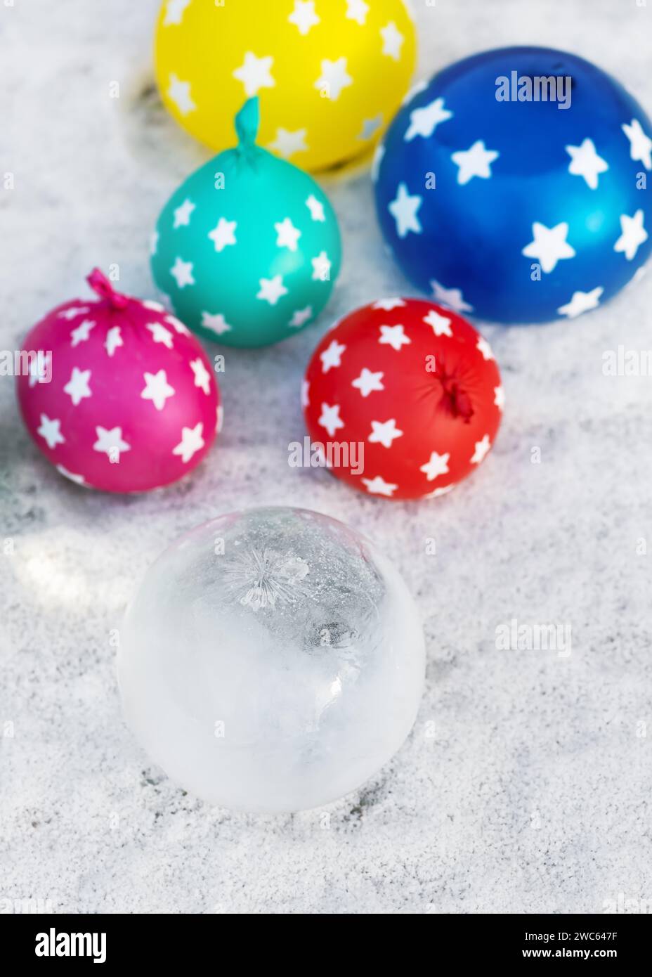 Draining the water and peeling away the remaining balloon. Making Ice ...