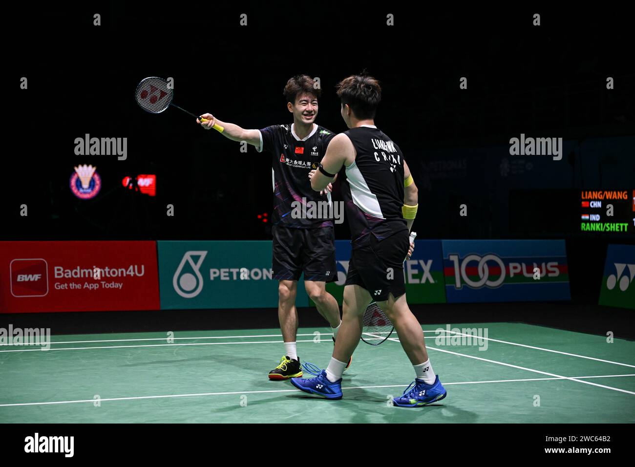 Kuala Lumpur, Malaysia. 14th Jan, 2024. Liang Weikeng(R)/Wang Chang of ...