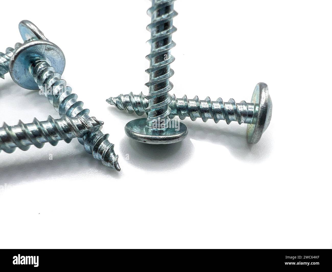 Self tapping screws for wood on a white background Stock Photo - Alamy