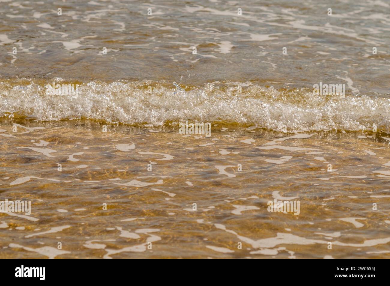 Waves coming into shore at an ocean beach Stock Photo - Alamy
