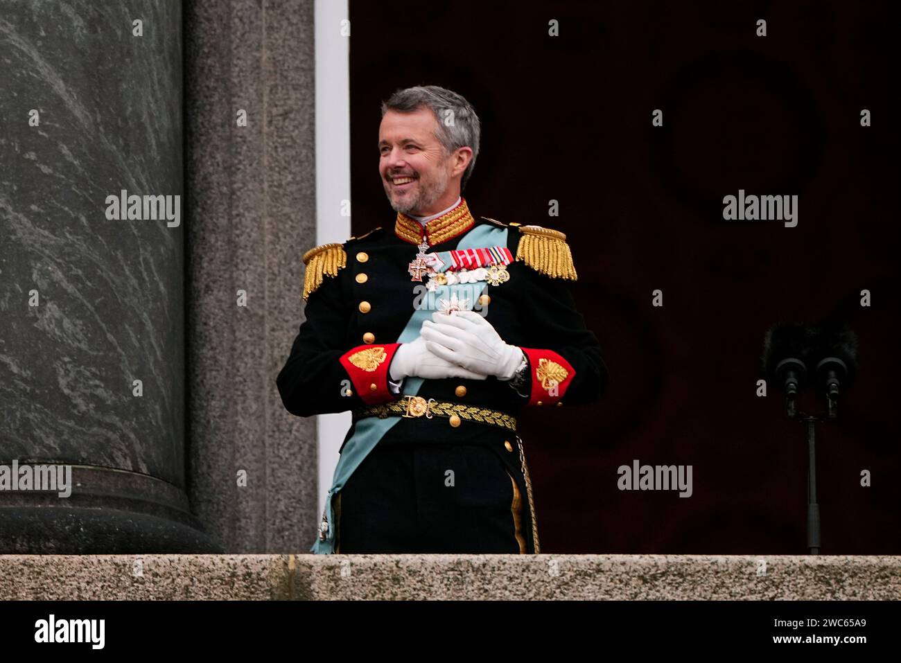 Denmark's King Frederik X smiles on the balcony, after the proclamation ...