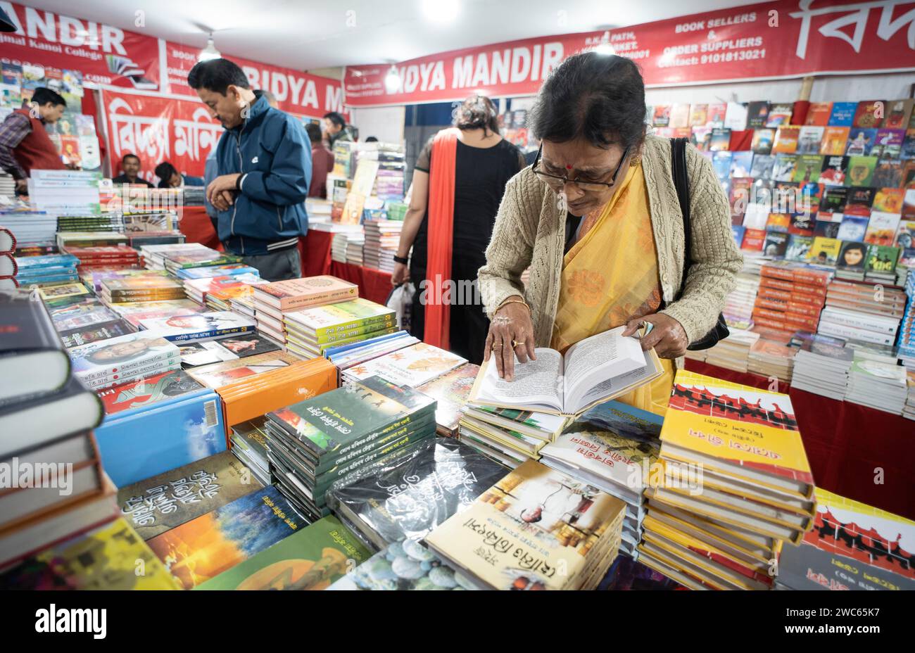 Book readers browsing books at a stall during Assam Book Fair, in Guwahati, Assam, India on 29 ...