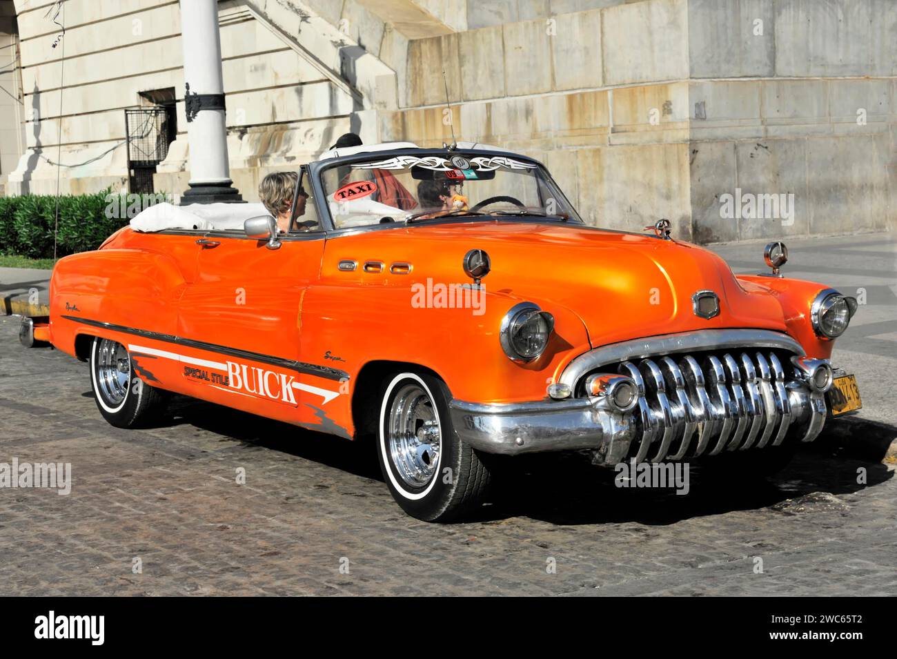 Open-top vintage car from the 1950s in the centre of Havana, Centro ...