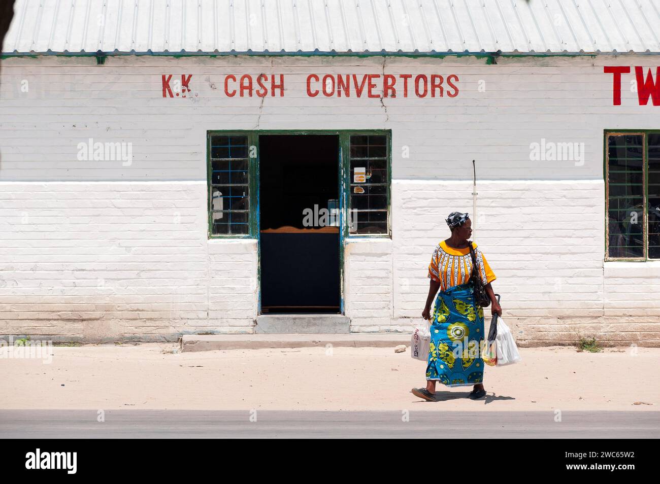 African woman, African woman in front of a shop, street, people, street ...