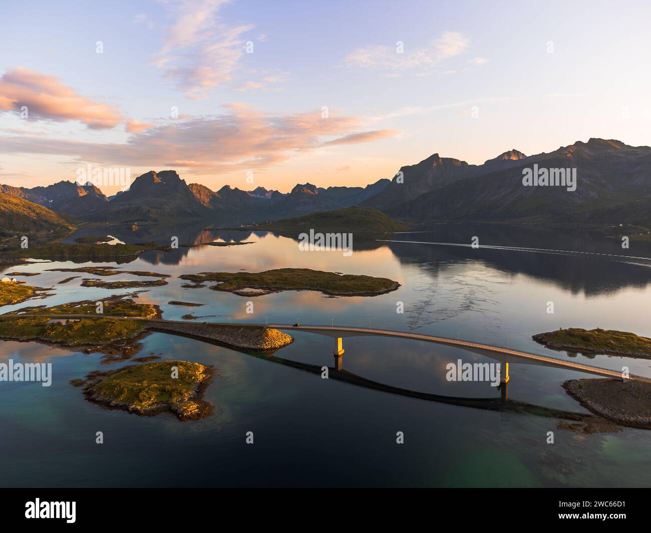 sunset view of Lofoten, Norway from above, with high mountains, fjord ...