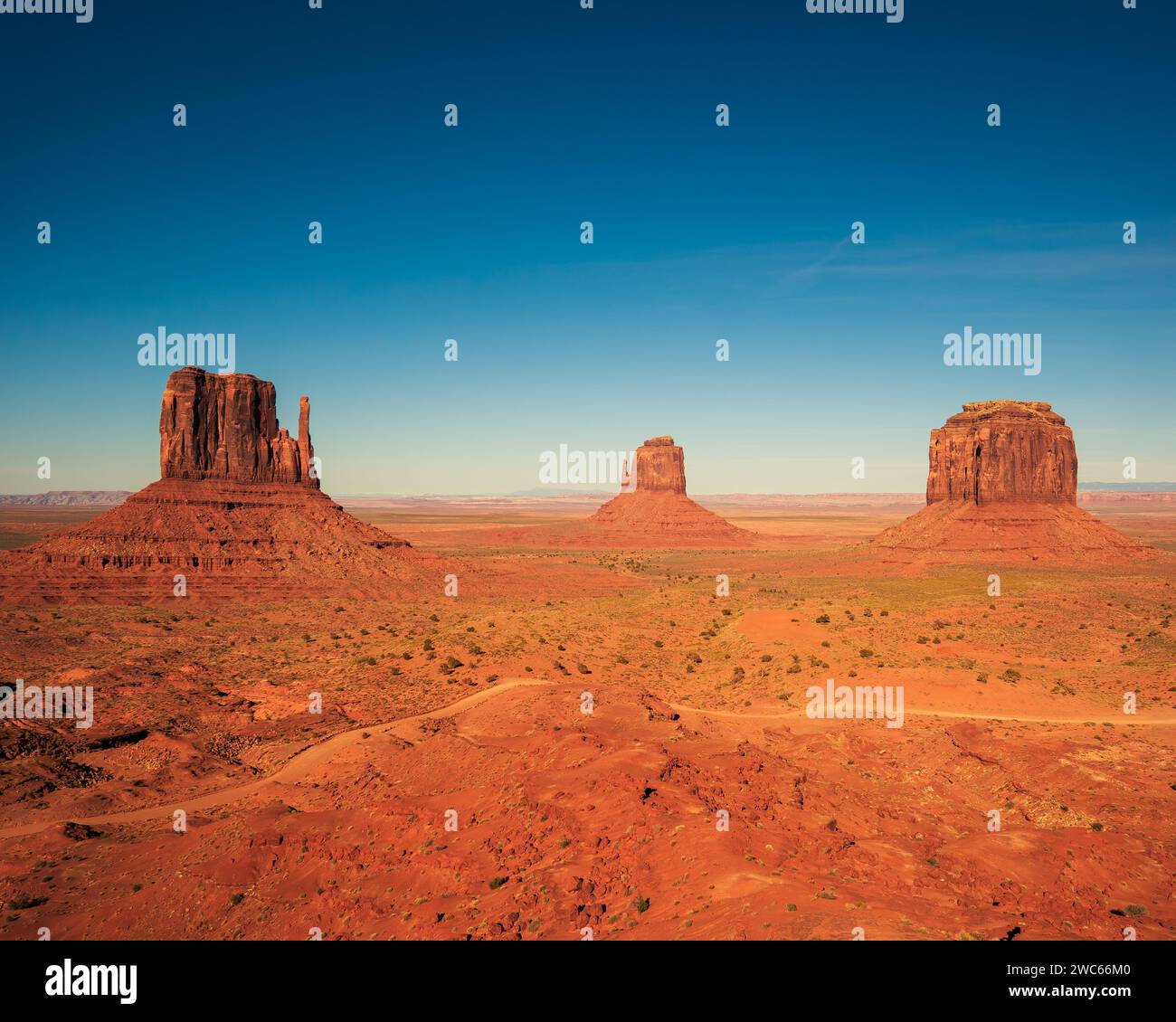 Monument valley landscape, Utah, USA, clear blue sky and long shadows ...