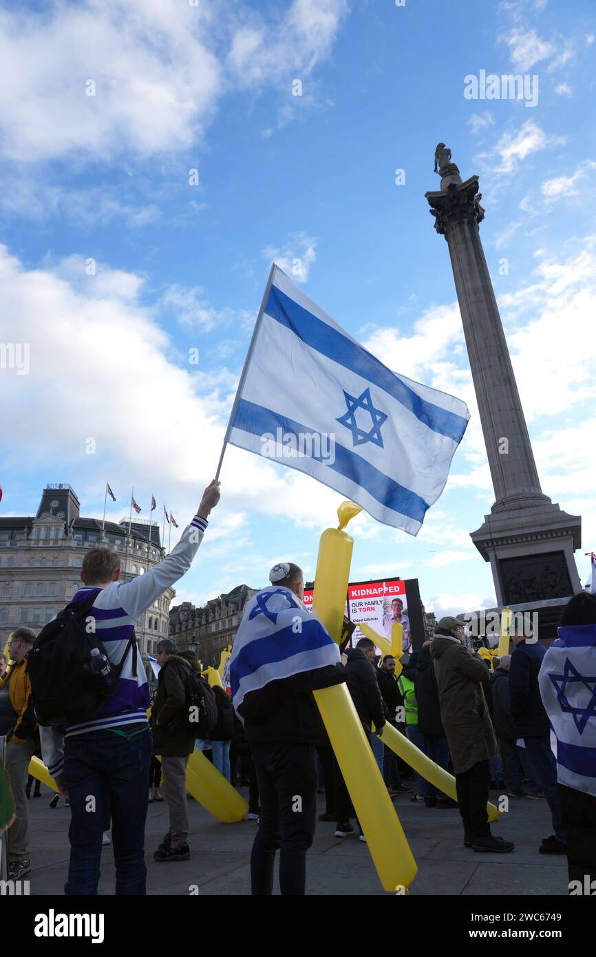 People attending a pro-Israel rally in Trafalgar Square, London ...