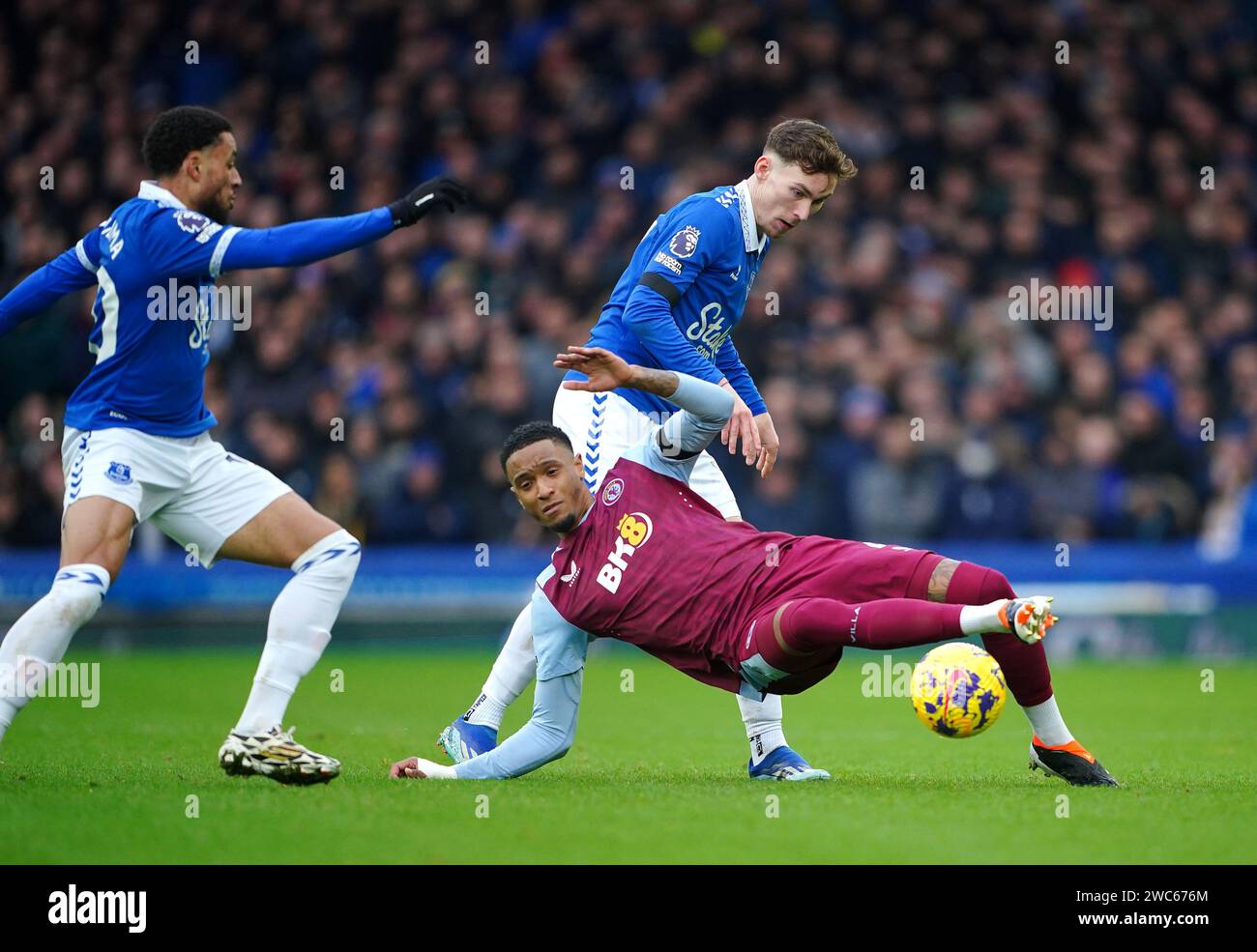 Everton's James Garner and Aston Villa's Ezri Konsa battle for the ball ...