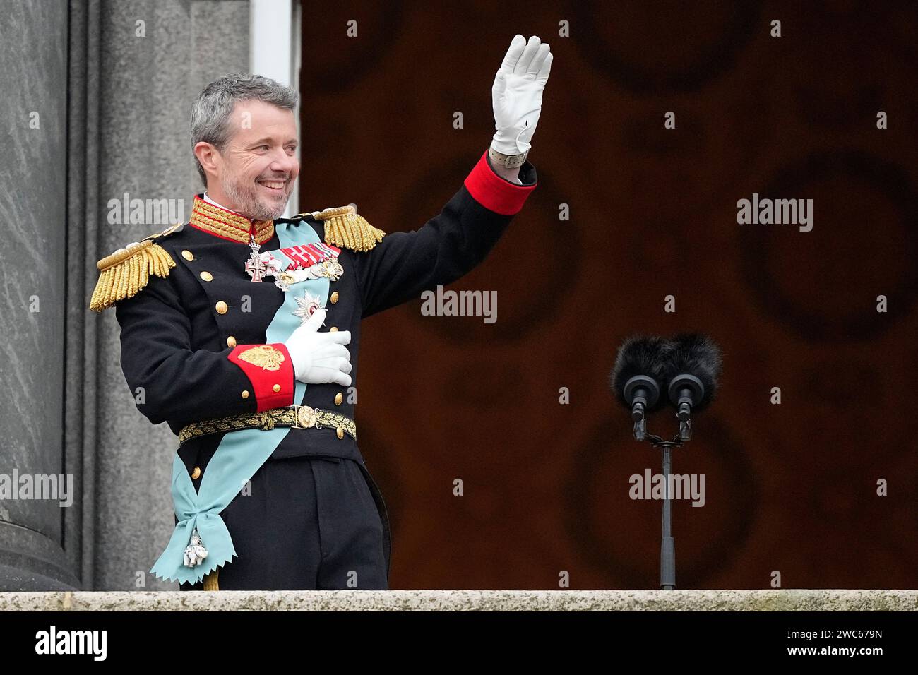 Denmark's King Frederik X waves from the balcony of Christiansborg ...