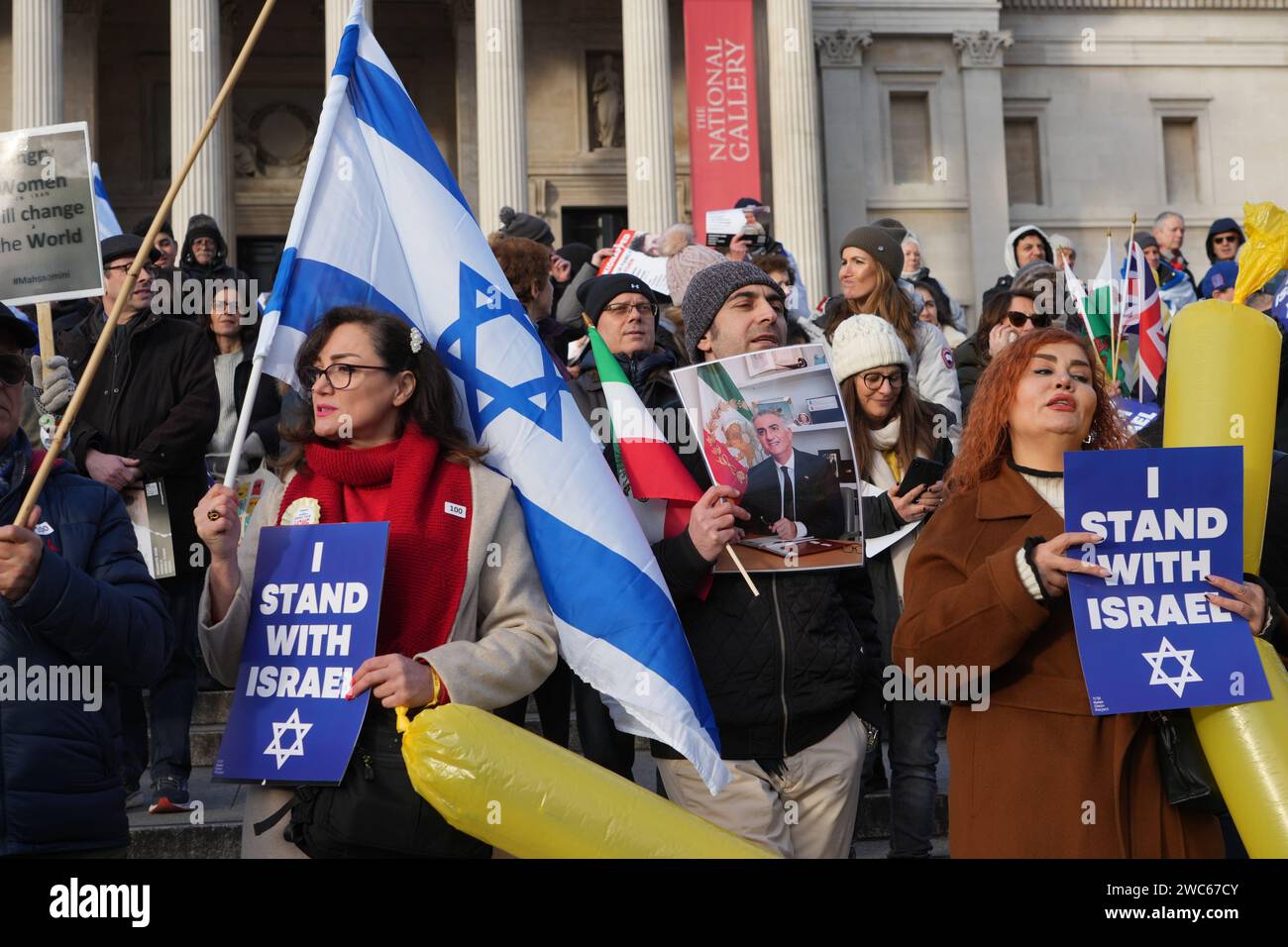 People attending a pro-Israel rally in Trafalgar Square, London ...