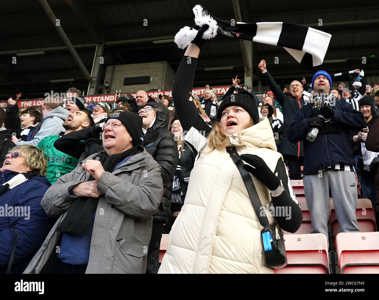 Newcastle United fans in the stands show their support during the Adobe ...