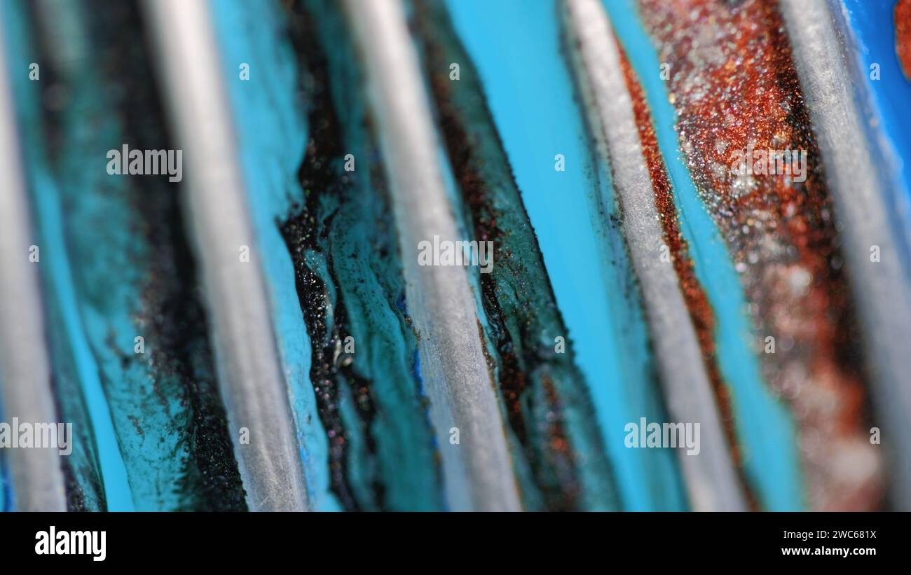 Glitter ink spill paint blend water blue red black Stock Photo - Alamy