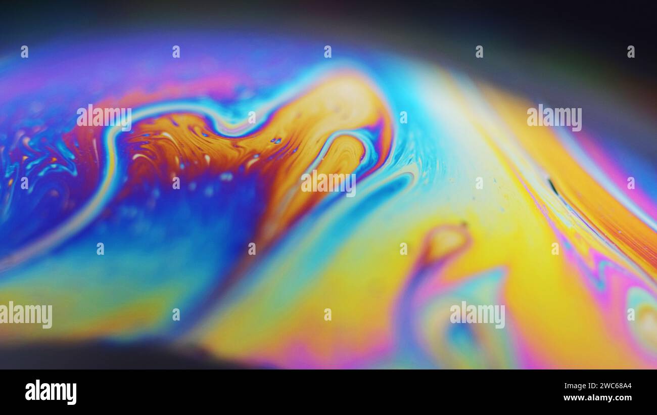 Dye mix oil fluid rainbow color paint blend wave Stock Photo - Alamy