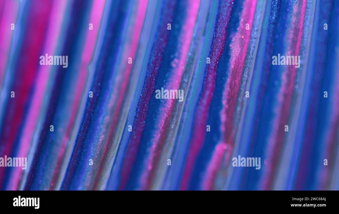 Sparkling paint drip ink stripes neon pink blue Stock Photo - Alamy