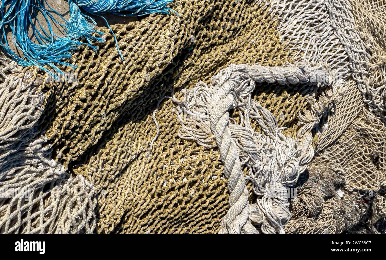 Old fishing net close-up. Texture of an old fishing net Stock Photo - Alamy