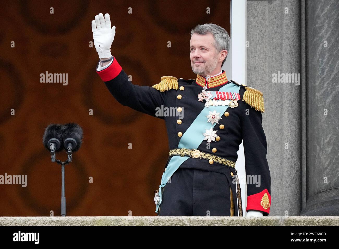 Denmark's King Frederik X waves from the balcony of Christiansborg ...