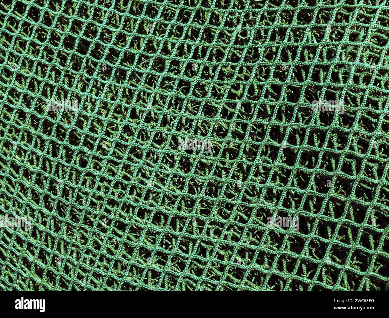 Old fishing net close-up. Texture of an old fishing net Stock Photo - Alamy
