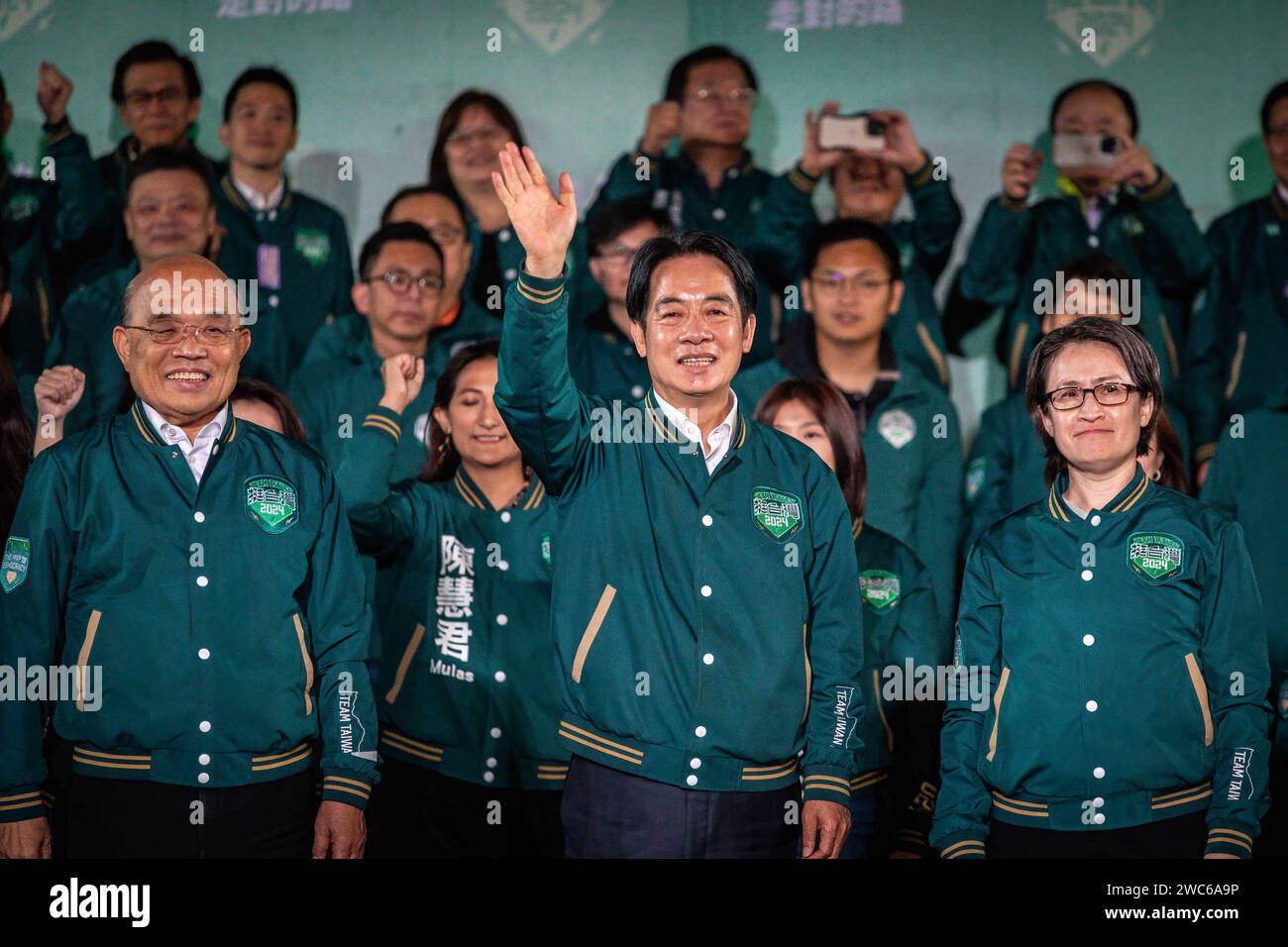 President-elect Lai Ching-te waves to his supporters after winning the ...
