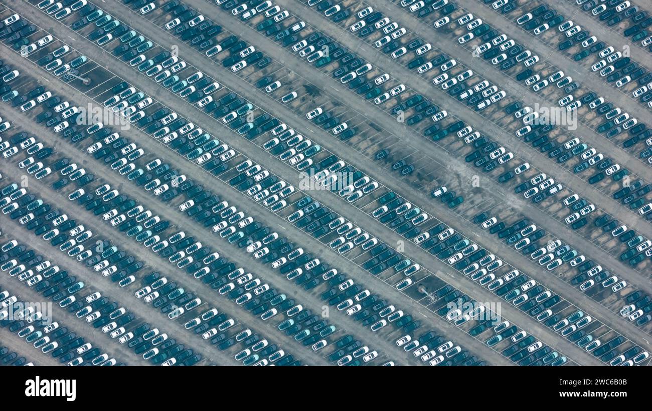 CHONGQING, CHINA - JANUARY 14, 2024 - Rows of new energy vehicles ...