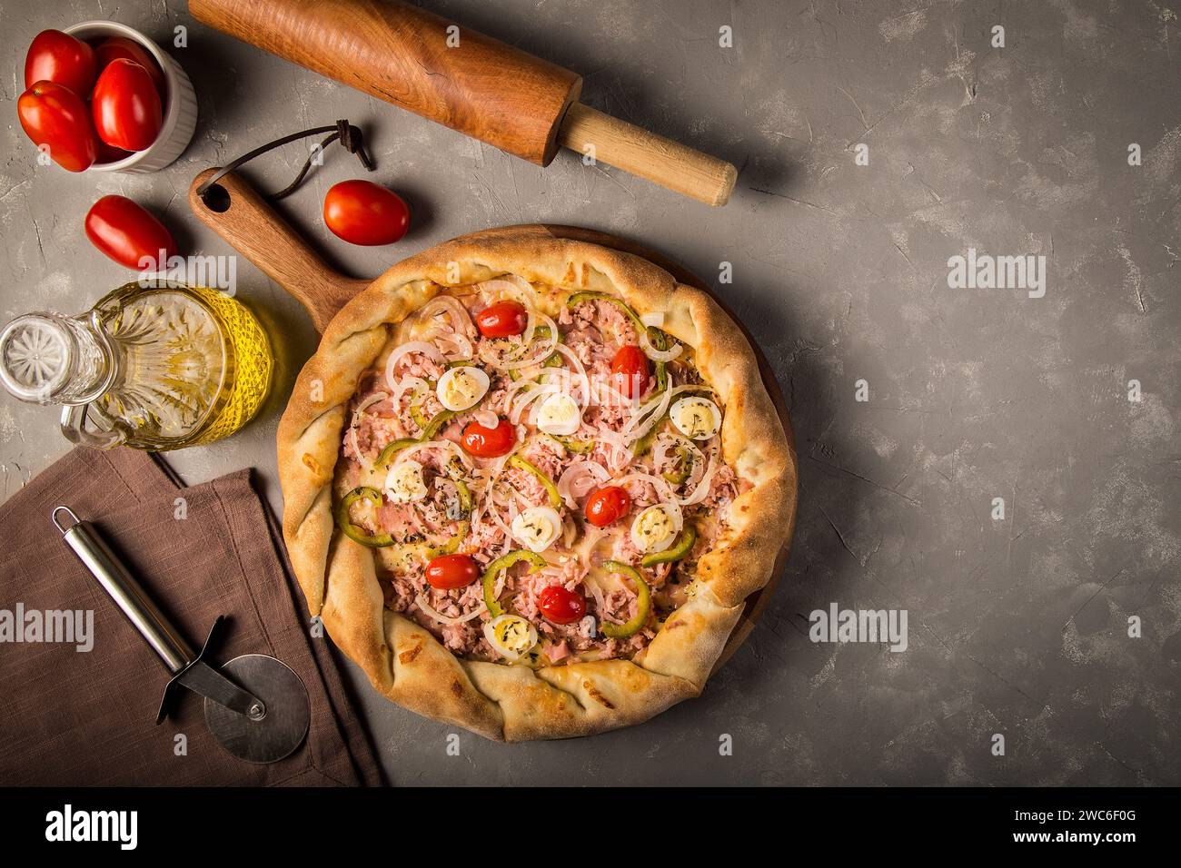 Artisanal pizza. Top view of delicious rustic pizza Stock Photo - Alamy