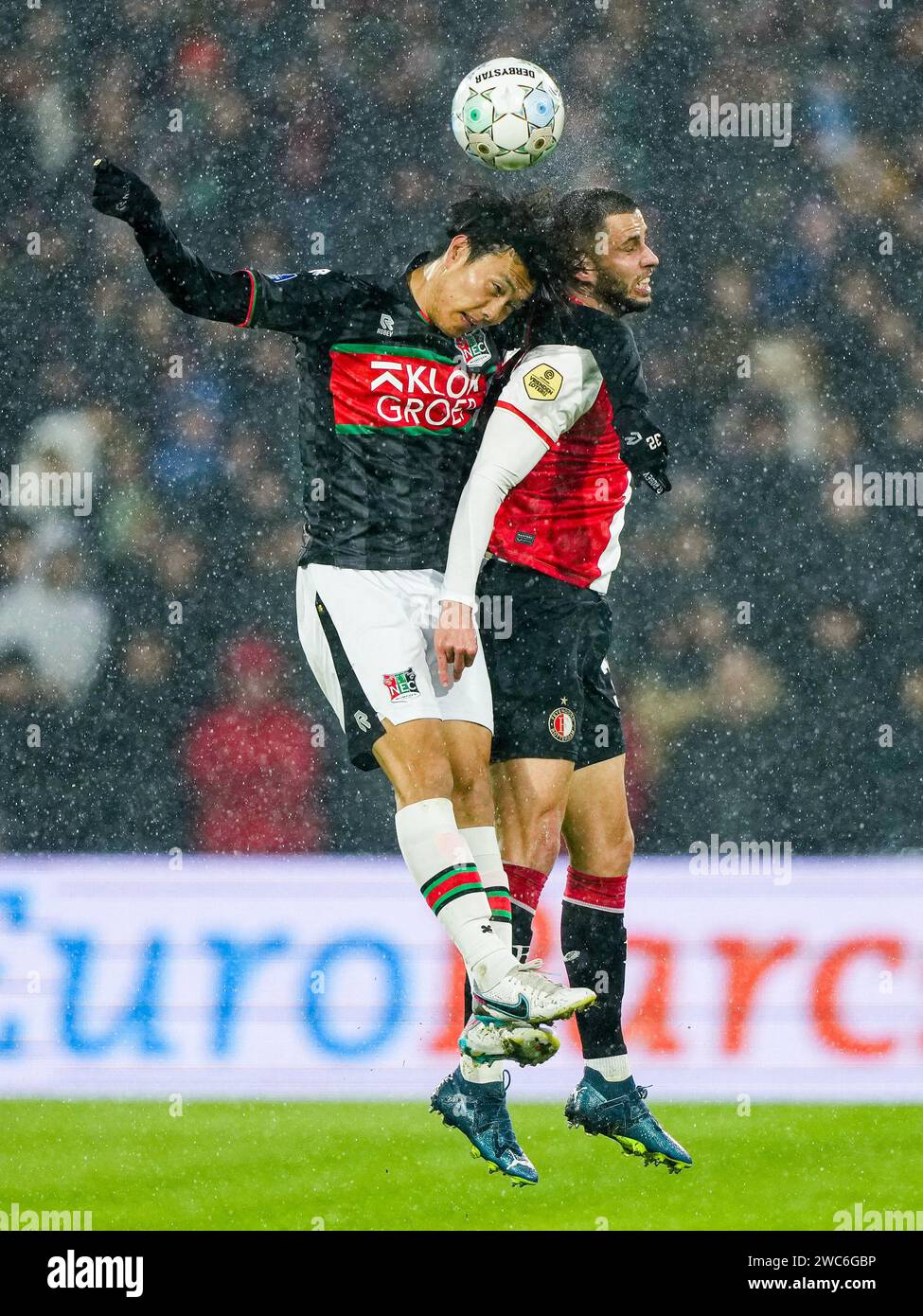 Rotterdam, The Netherlands. 14th Jan, 2024. Rotterdam - Koki Ogawa of NEC Nijmegen, David Hancko ...