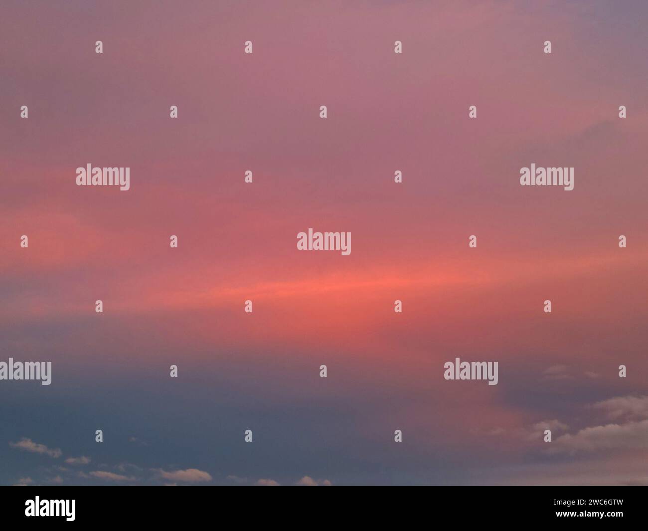 The pink clouds in the sunset sky Stock Photo - Alamy