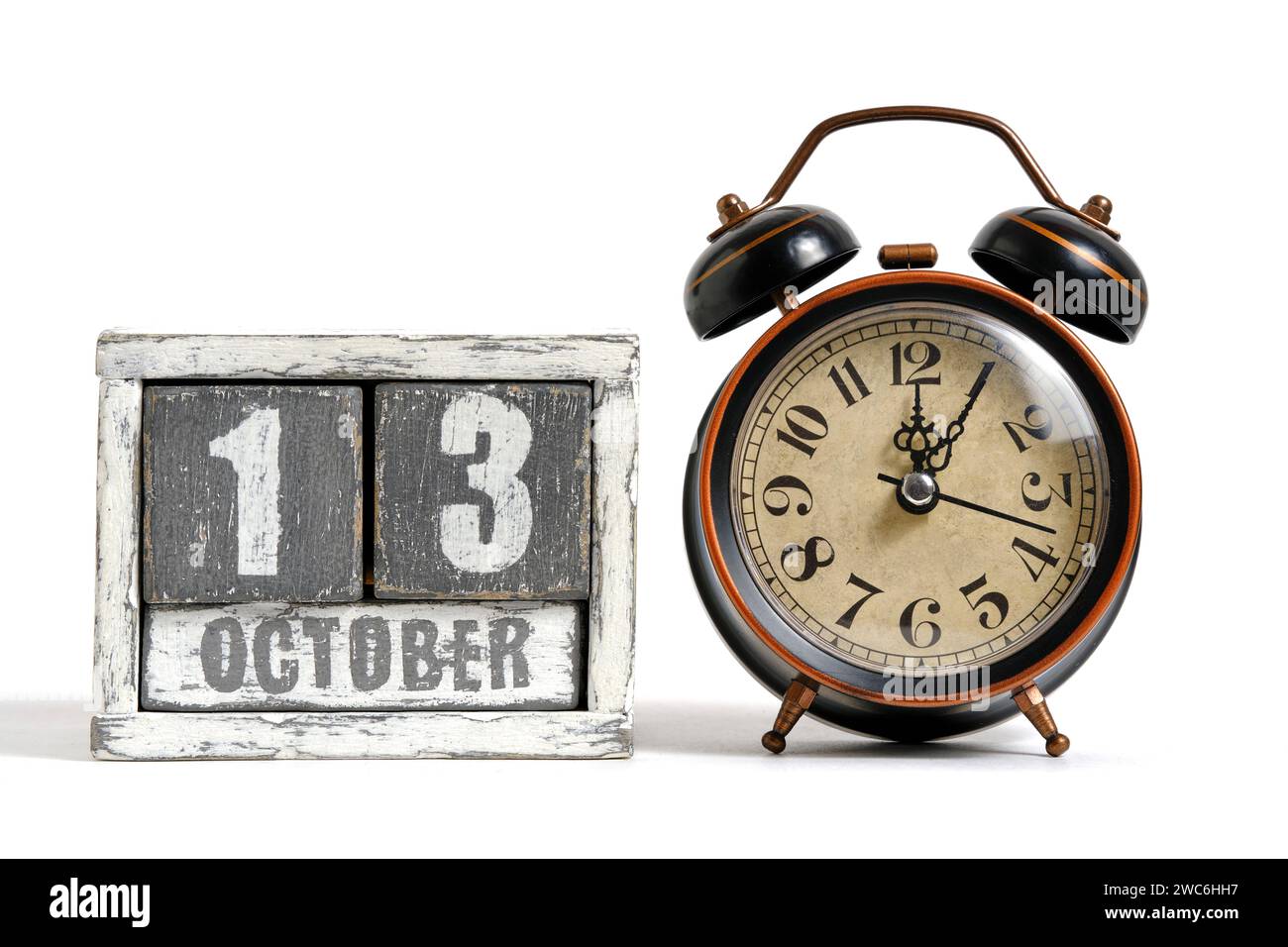 October 13 on wooden calendar with alarm clock white background Stock ...