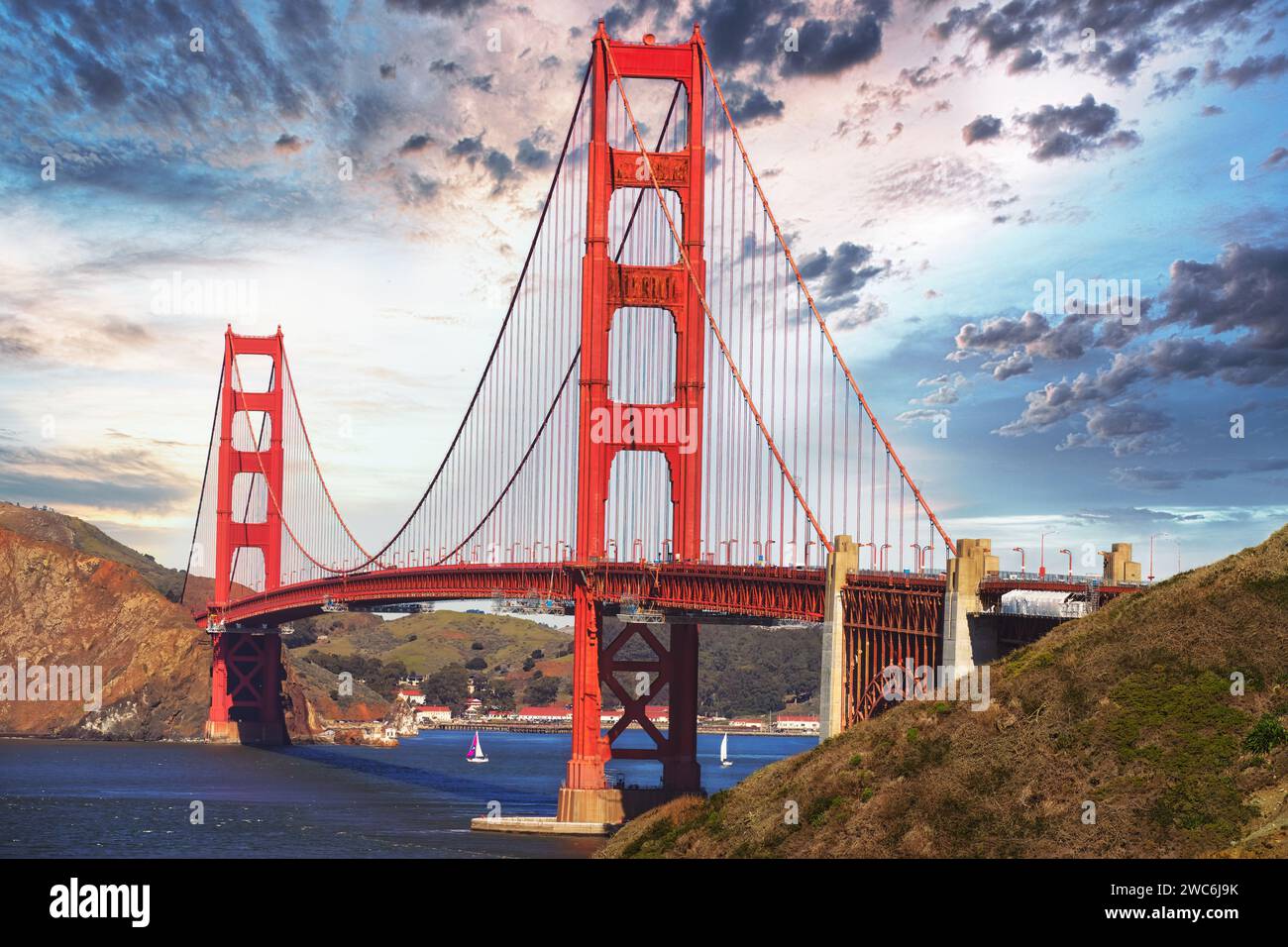 Iconic Red: The Golden Gate Bridge at Sunset Stock Photo - Alamy